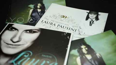 CDs and artwork of Italian singer LAURA ... | Stock Video | Pond5