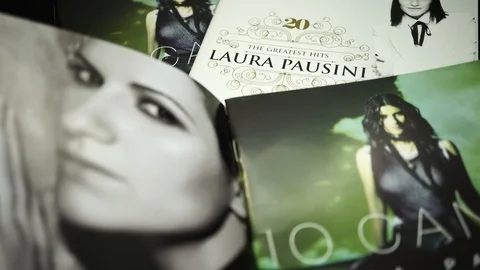 CDs and artwork of Italian singer LAURA ... | Stock Video | Pond5