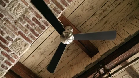 Ceiling air fan slowly spinning on old a... | Stock Video | Pond5