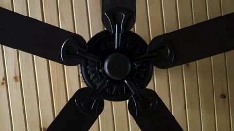 Ceiling Fan Turning on and Spinning from... | Stock Video | Pond5