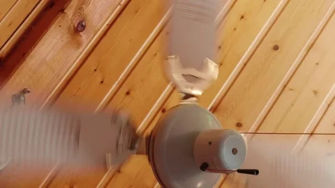 Ceiling fan working. Vertical video. Rot... | Stock Video | Pond5
