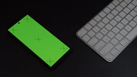 Cell Phone green screen, Apple Keyboard,... | Stock Video | Pond5
