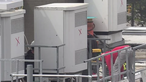 Cell phone Technicians installing 5G cel... | Stock Video | Pond5