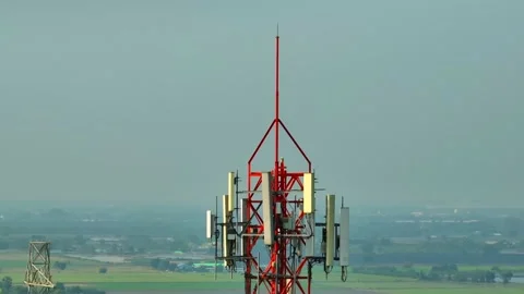 A cell site tower from a drone aerial vi... | Stock Video | Pond5