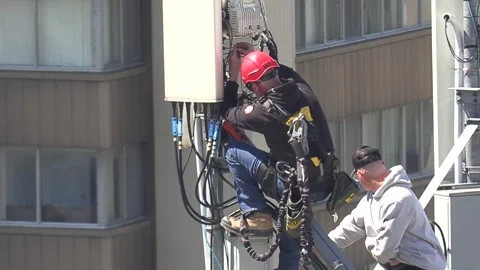 Cell Tower Worker Stock Footage ~ Royalty Free Stock Videos | Pond5