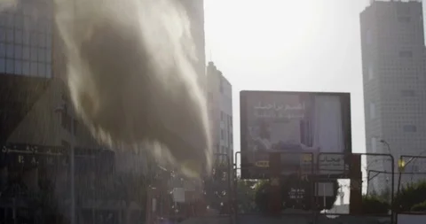 Cement falling off the skyscraper at con... | Stock Video | Pond5