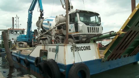 Cement mixer truck on floating barge dur... | Stock Video | Pond5