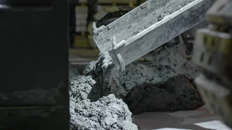 Cement sliding down a chute to reinforce... | Stock Video | Pond5