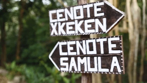 CENOTE XKEKEN and CENOTE SAMULA sign at ... | Stock Video | Pond5