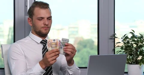 Ceo Business Man Holding and Counting Mo... | Stock Video | Pond5