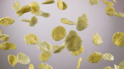 Cereal corn flakes are flying up and rot... | Stock Video | Pond5