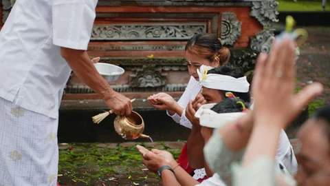 Ceremony of blessing and praying in bali... | Stock Video | Pond5