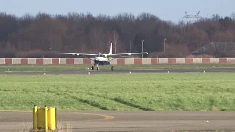 Cessna 208 Caravan Landing at a Regional... | Stock Video | Pond5