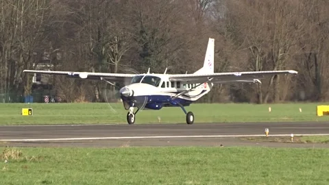 Cessna 208 Caravan Vacating the Runway a... | Stock Video | Pond5