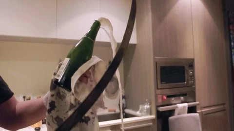 Champagne bottle being sabered, bottle p... | Stock Video | Pond5