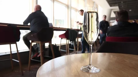 Champagne glass on the table at the depa... | Stock Video | Pond5