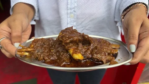 Champaran style spicy handi mutton hold ... | Stock Video | Pond5
