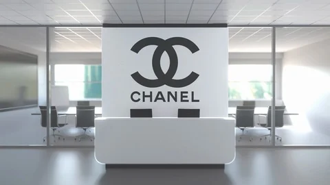 CHANEL logo above reception desk in the ... | Stock Video | Pond5