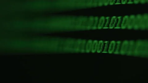 Changing Focus on Binary Code on a Scree... | Stock Video | Pond5