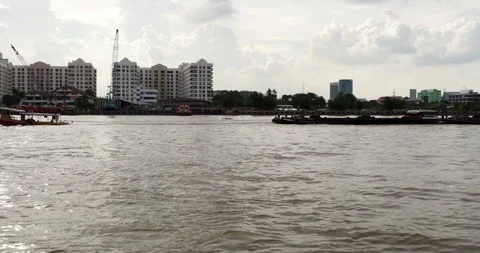 Chao Phraya River tugboat pulling cargo ... | Stock Video | Pond5
