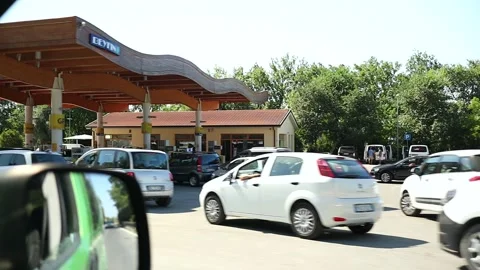 Chaotic queues at the gas station before... | Stock Video | Pond5