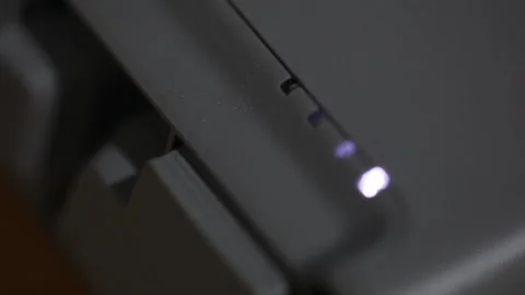 Charging battery, blinking green lights,... | Stock Video | Pond5