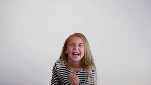 Charming girl burst into laughter. | Stock Video | Pond5