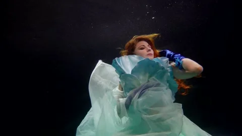 charming redhead woman floating underwat... | Stock Video | Pond5