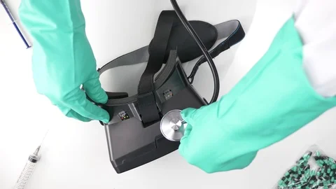 Checking a Broken VR Headset With a Stet... | Stock Video | Pond5