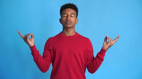 Cheerful black man doing meditation exer... | Stock Video | Pond5