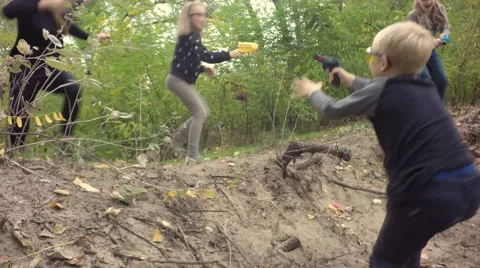 Cheerful children playing war games. Ins... | Stock Video | Pond5