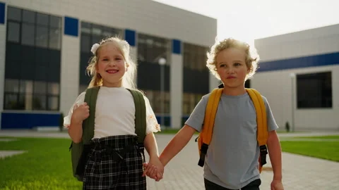 Cheerful First-Graders Boy And Girl With... | Stock Video | Pond5