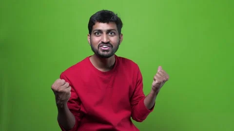 Cheerful Indian man on green screen. Por... | Stock Video | Pond5