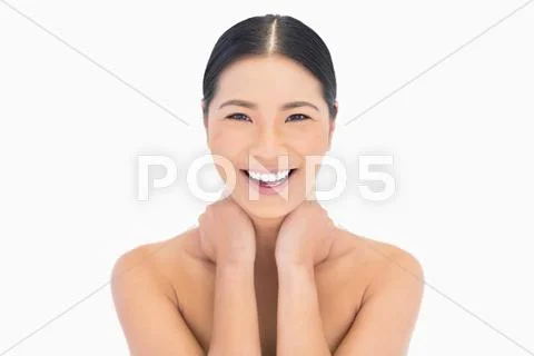 Cheerful natural model posing touching her neck ~ Hi Res #27706233