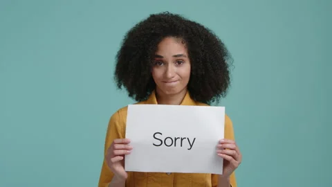 Cheerful, positive lady with a guilty fa... | Stock Video | Pond5