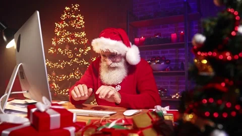 Cheerful santa grandfather typing keyboa... | Stock Video | Pond5