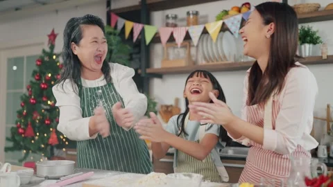 Cheerful three generations women clappin... | Stock Video | Pond5