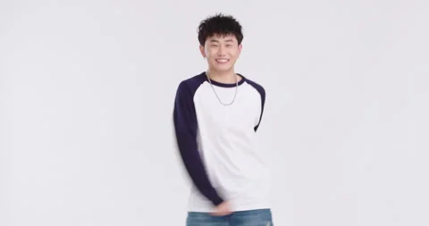 Cheerful young Chinese man dancing,4K | Stock Video | Pond5