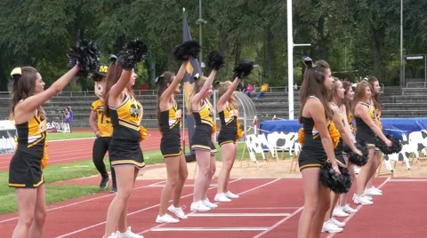 Cheerleaders girls dancing cheering in R... | Stock Video | Pond5