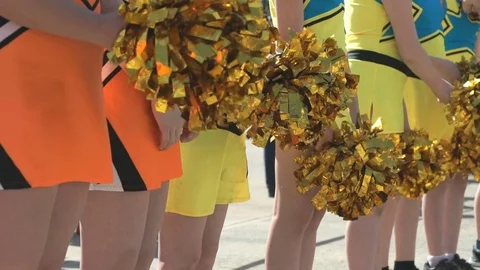 Cheerleaders teenagers dressed in yellow... | Stock Video | Pond5