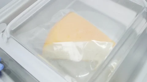 Cheese vacuum packaging at factory | Stock Video | Pond5