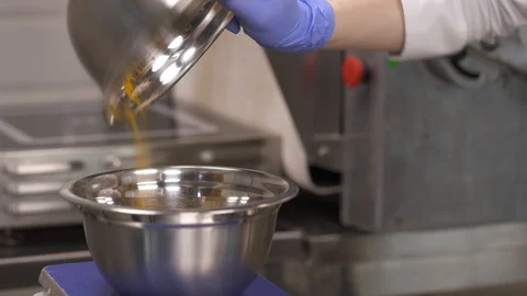 A chef adding aromatic turmeric powder t... | Stock Video | Pond5