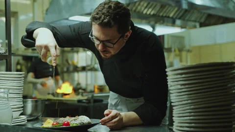 Chef Adding Olive Oil to Fish Served on ... | Stock Video | Pond5