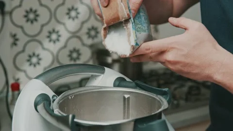 Chef adds a lot of salt into kitchen mix... | Stock Video | Pond5