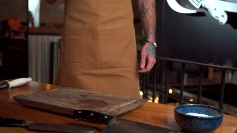 chef butcher hit the cutting board with ... | Stock Video | Pond5
