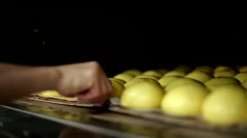 Chef carrying a tray full of burger buns... | Stock Video | Pond5