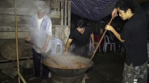 Chef cooking curry pork in wok pan Tradi... | Stock Video | Pond5