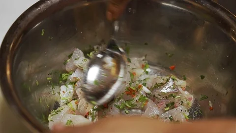 Chef Mixing Sole Fish in a Bowl for Cevi... | Stock Video | Pond5