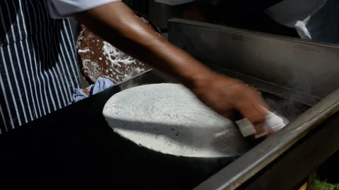 Making Dosa Stock Footage ~ Royalty Free Stock Videos | Pond5