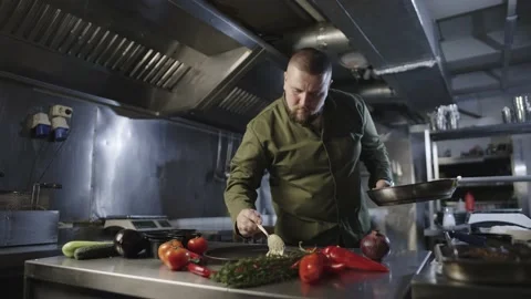 A chef serves a plate of food in a resta... | Stock Video | Pond5